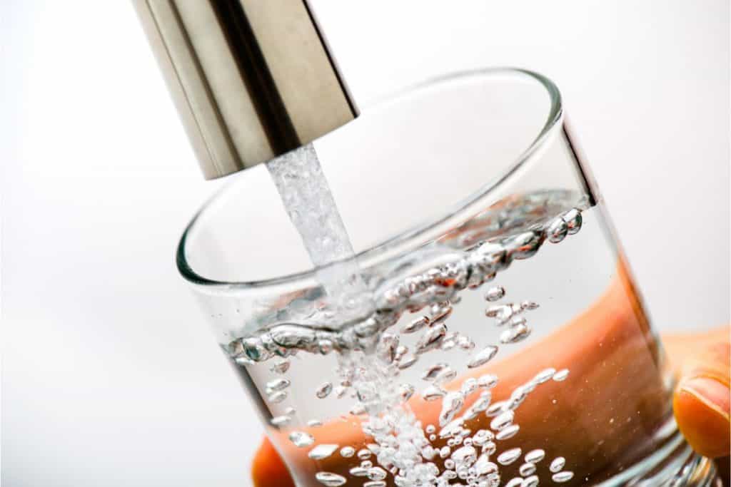 How Many Bottles of Water Should You Drink a Day? - Water Guides