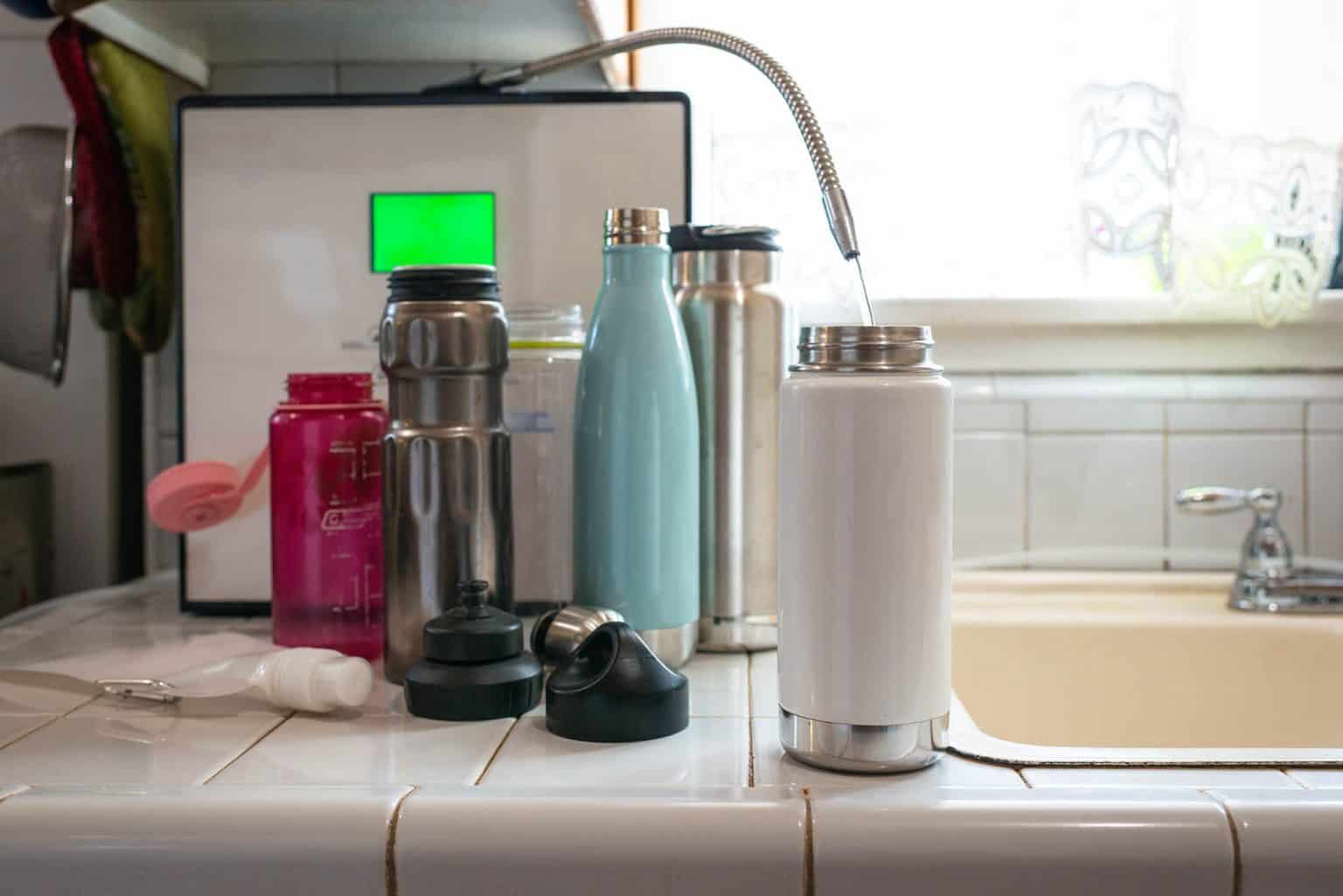 How Many Bottles of Water Should You Drink a Day? - Water Guides